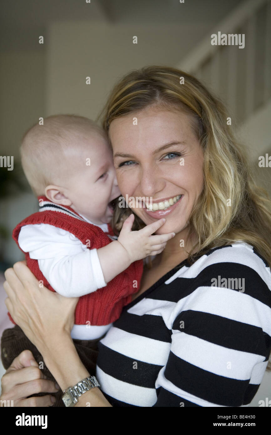 Happy mother loving baby mother son hugging Stock Photo - Alamy Happy mother loving baby mother son hugging Stock Photo - Alamy