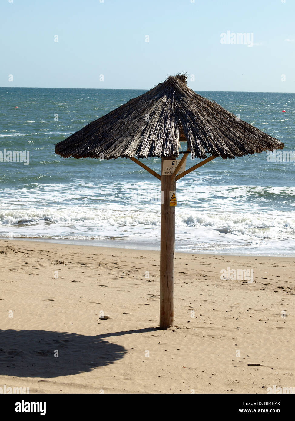Parasol on swanage beach hi-res stock photography and images - Alamy
