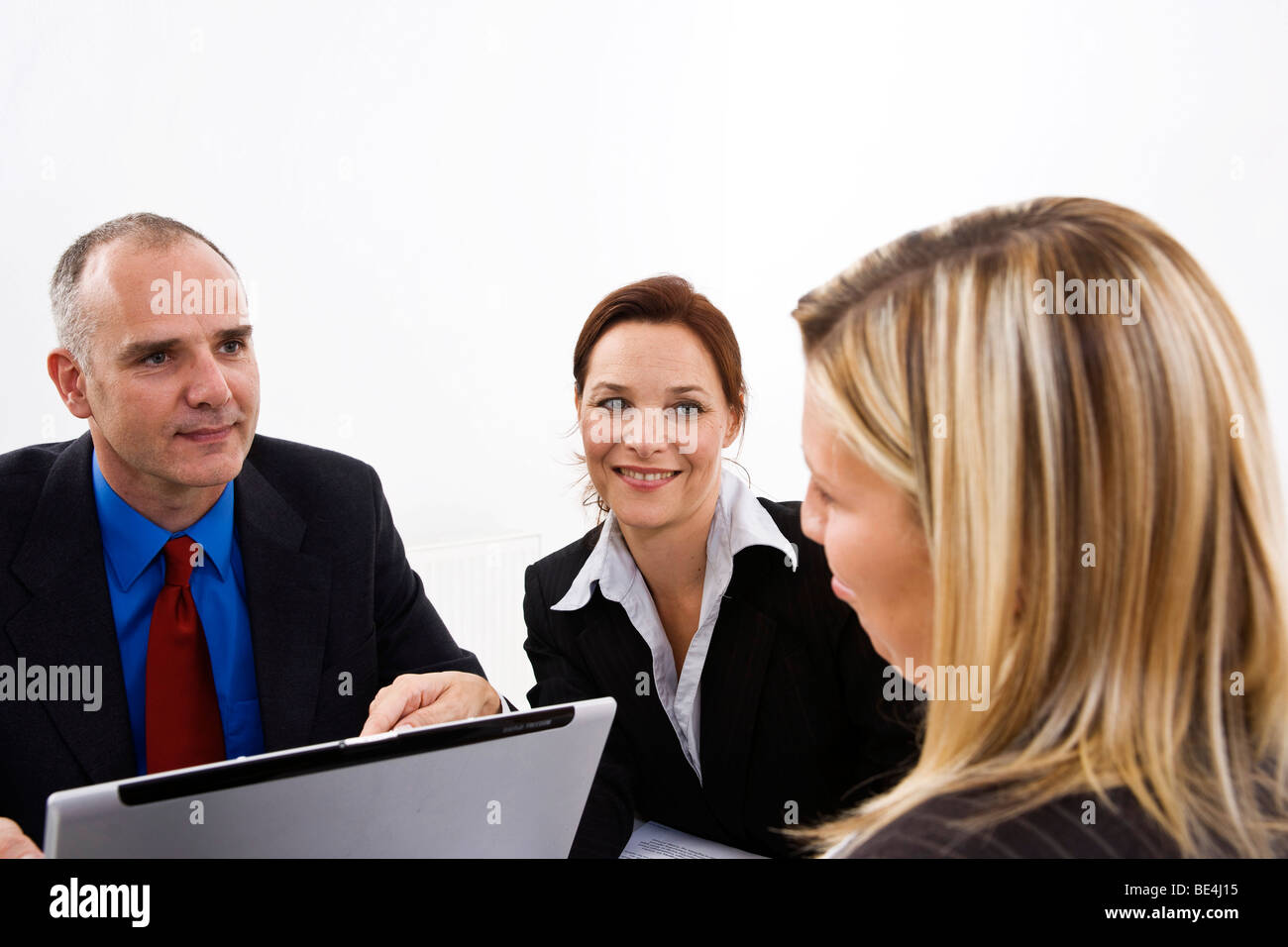 Team meeting on a laptop Stock Photo - Alamy