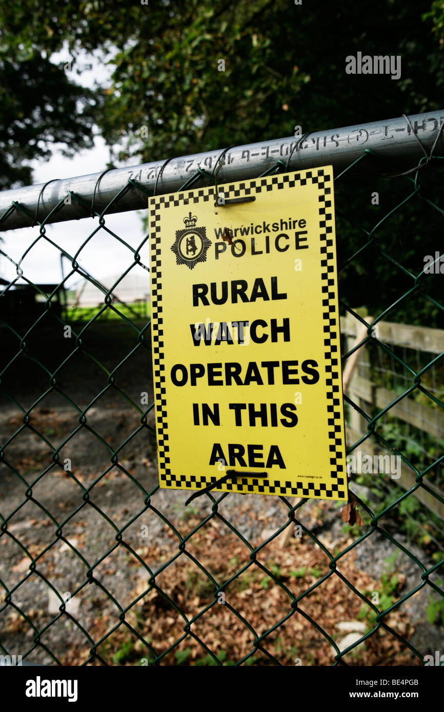 Rural Watch Operates in this Area Sign on farm gate Stock Photo - Alamy