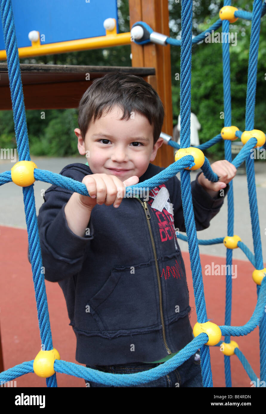 4 year old boy playing alone in Greenwich Park Stock Photo - Alamy