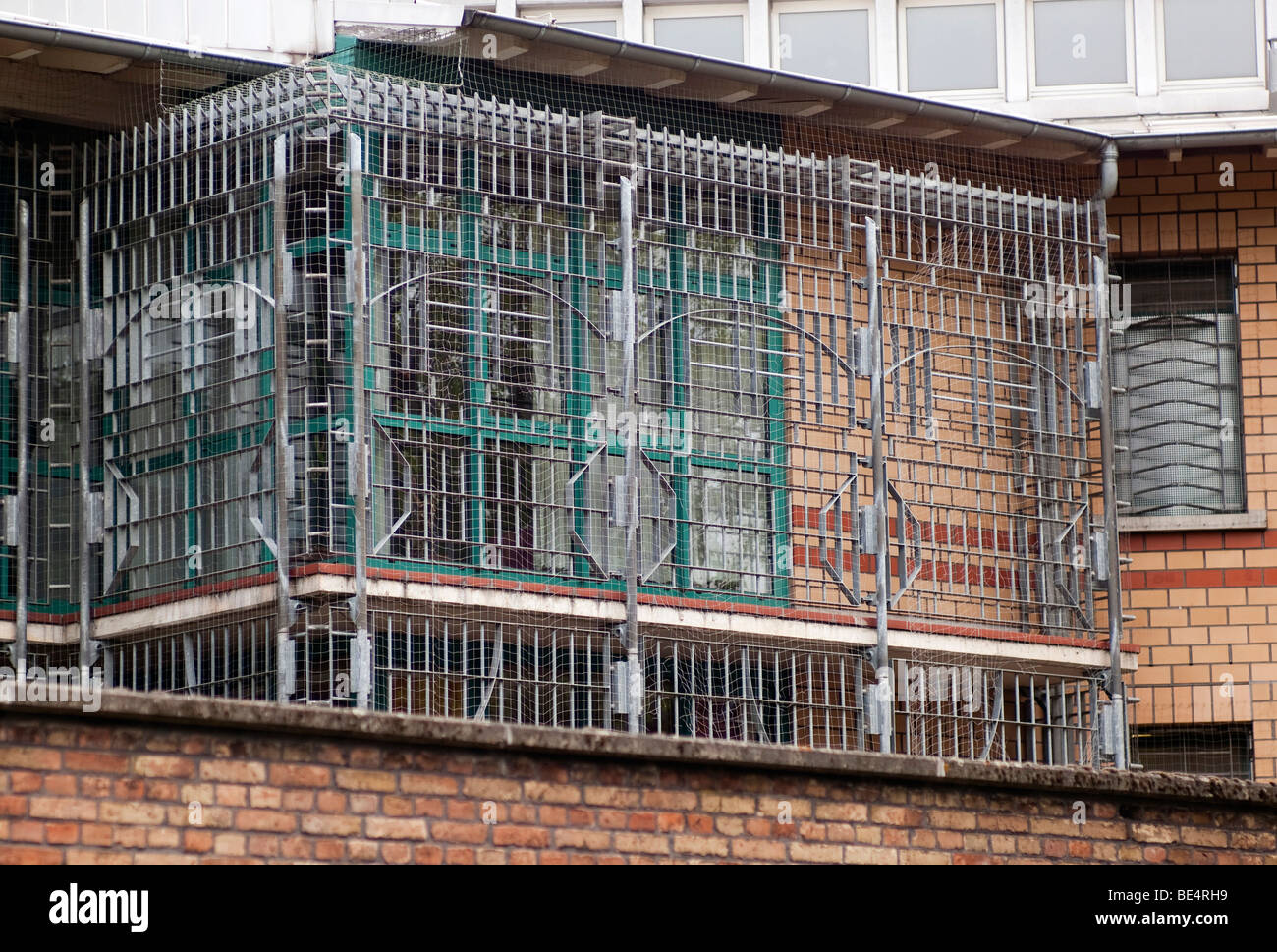 Women prison bars hi-res stock photography and images - Alamy