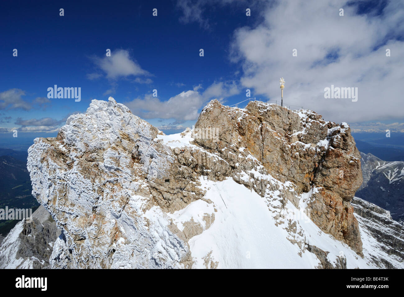 Summit of Zugspitze Mountain with the summit cross in 2962 m altitude ...