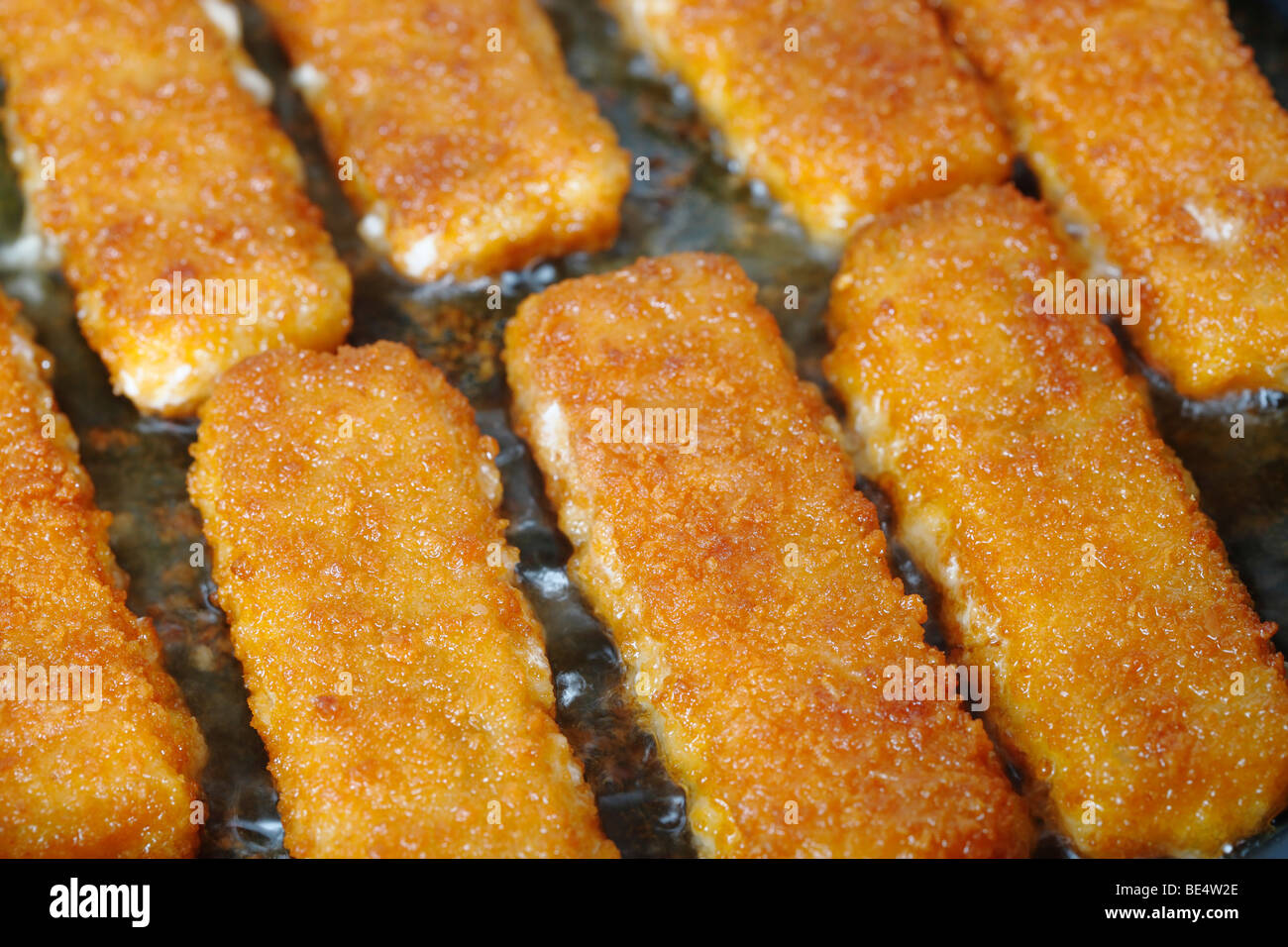 Fish sticks in hot frying pan Stock Photo - Alamy