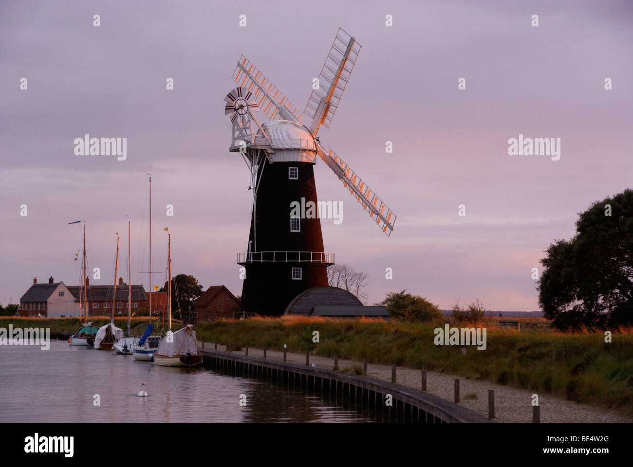 Berney Arms Windpump with traditional Norfolk Broads sailing boats ...