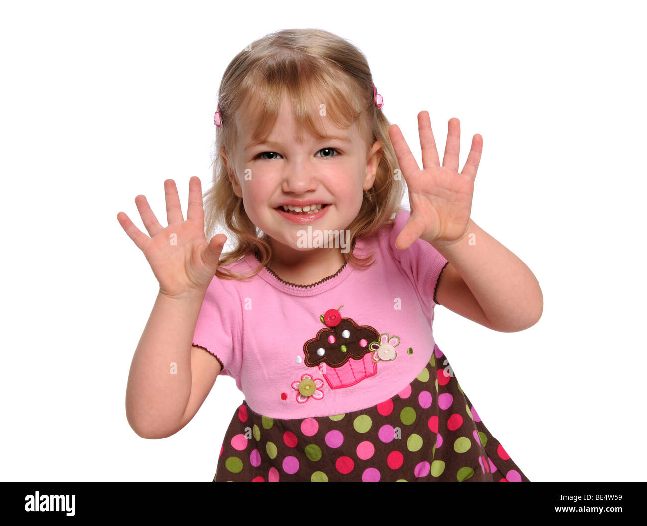 Portrait of young girl showing palm of hands isolated over white Stock ...