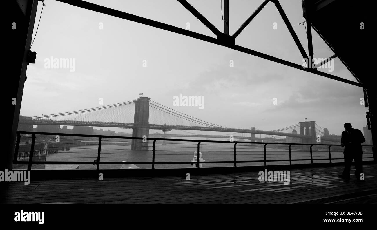 Brooklyn Bridge view in a grey afternoon, New York City, USA Stock ...