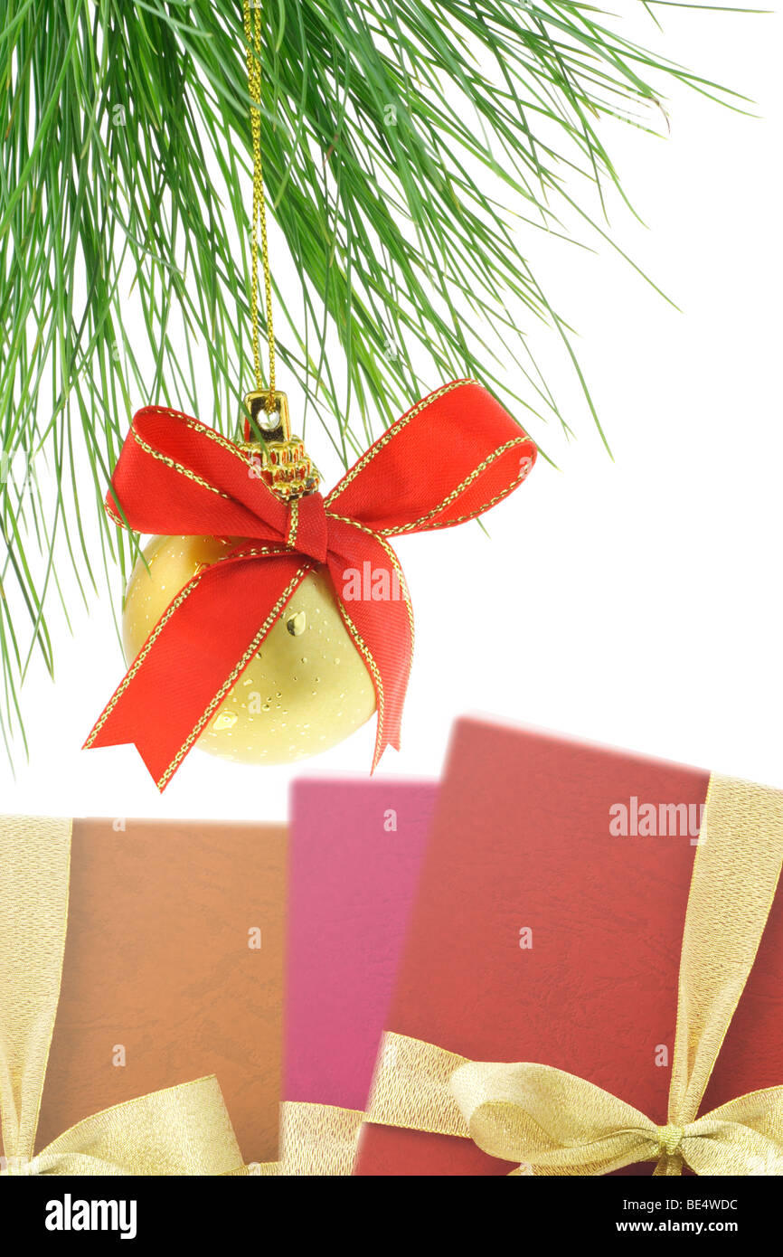 Christmas bauble and gift boxes on white background Stock Photo - Alamy