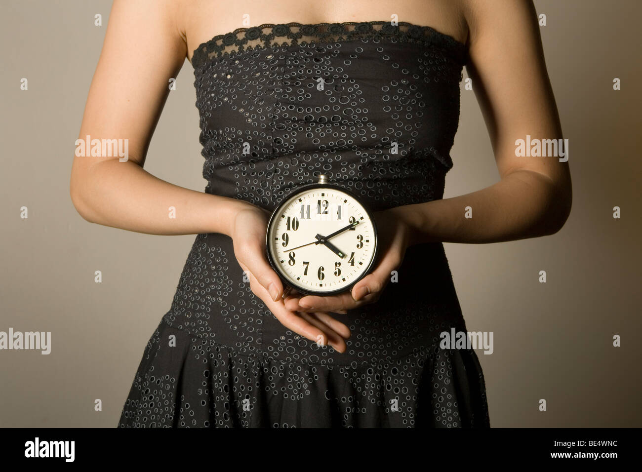 time in womans hands Stock Photo - Alamy
