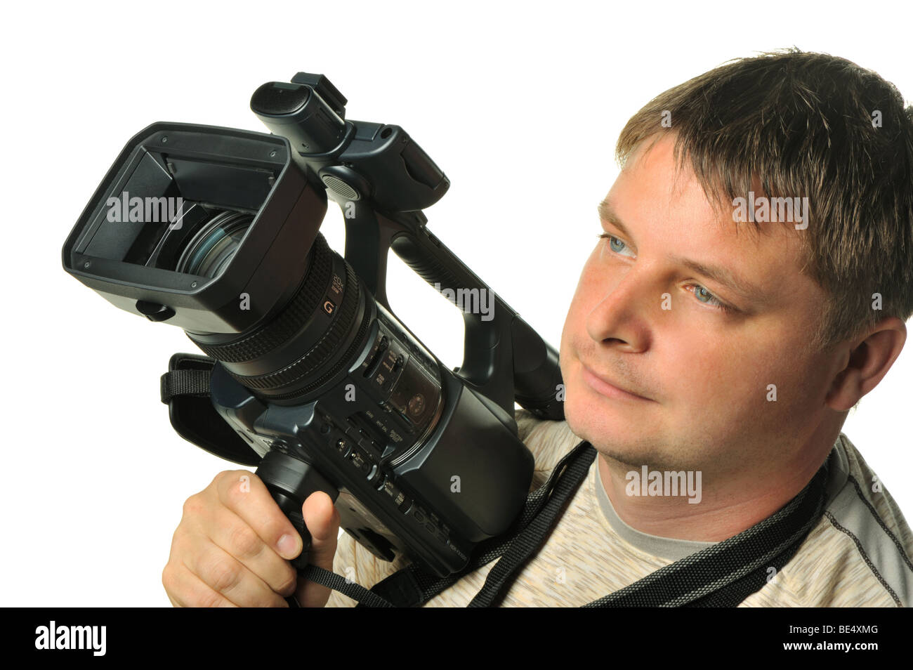 The man with a videocamera. It is isolated on a white background Stock ...