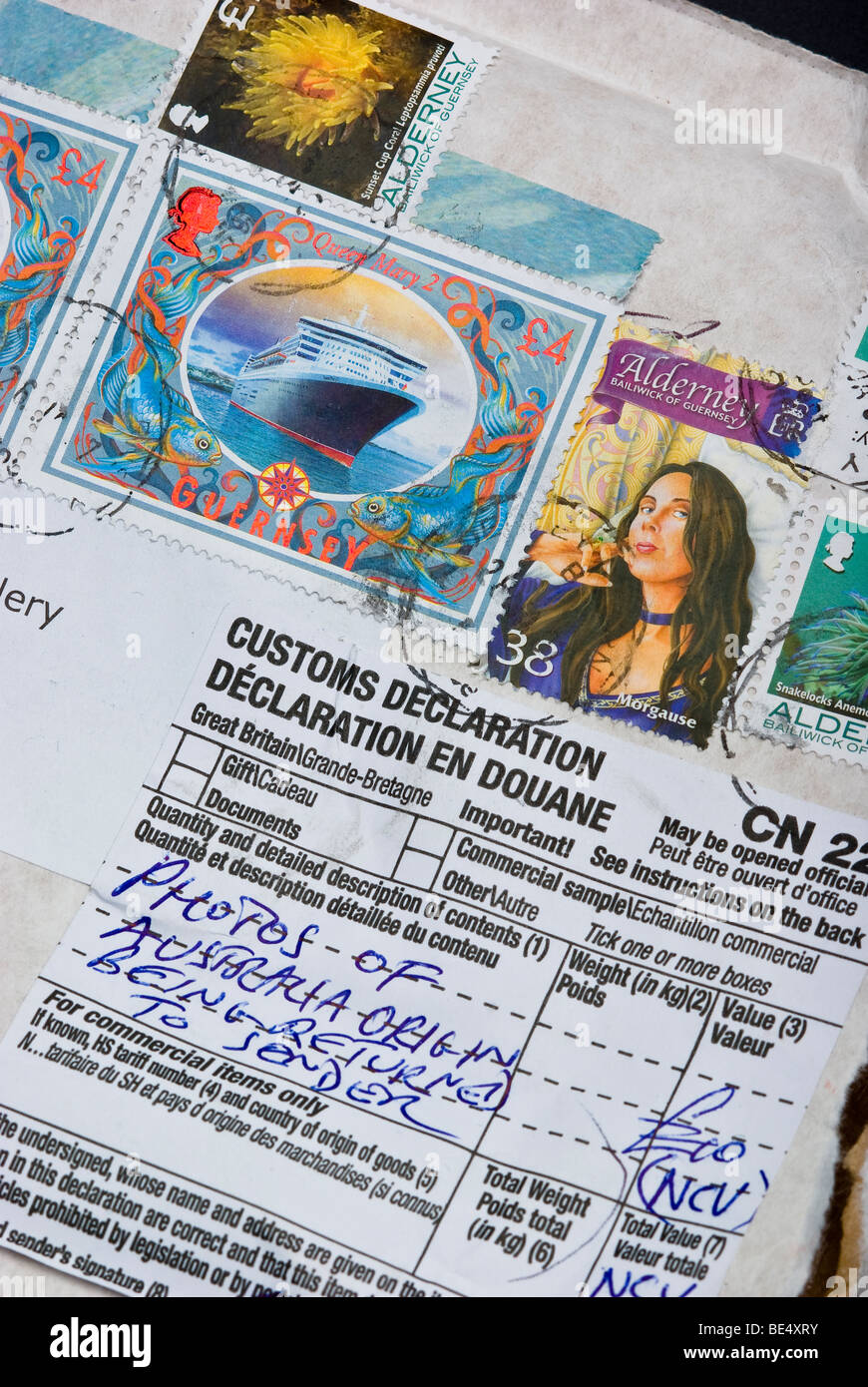 Envelope with colorful stamps from Guernsey and showing customs ...