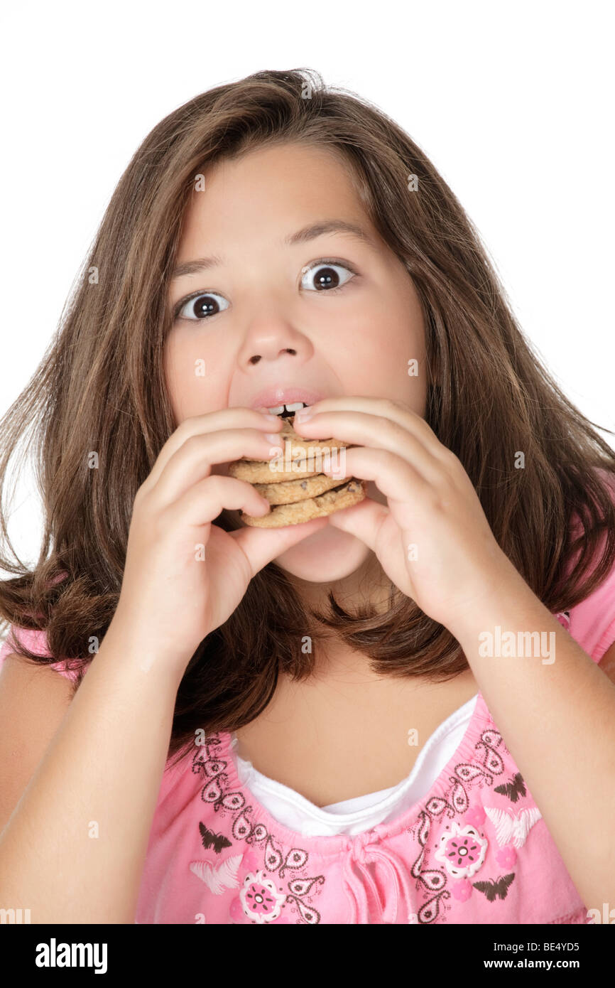 Cute Caucasian girl eating Chocolate Chip Cookies Stock Photo - Alamy