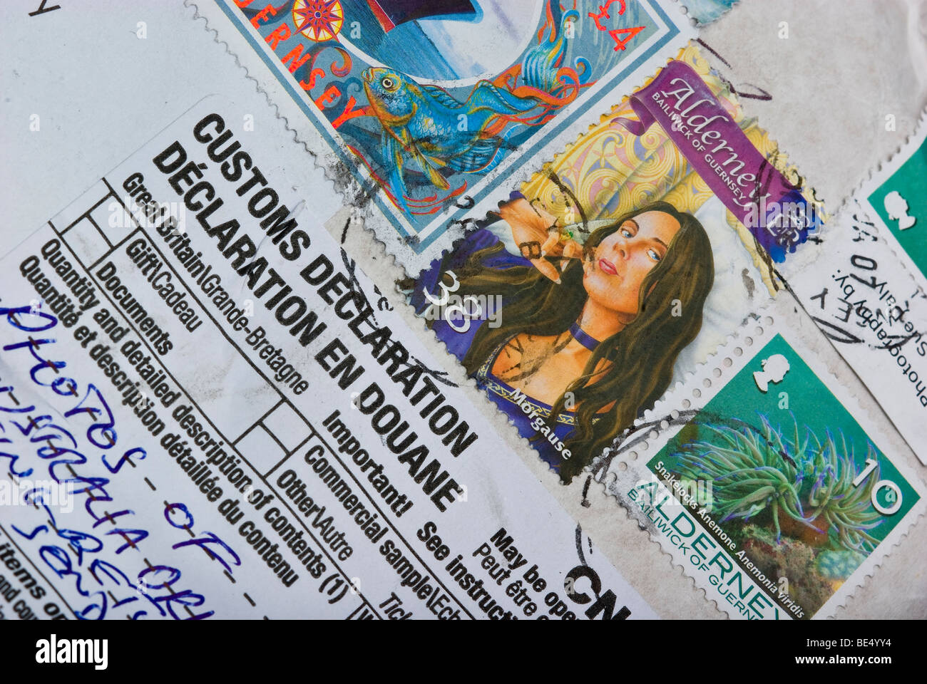 Envelope with colorful stamps from Guernsey and showing customs ...