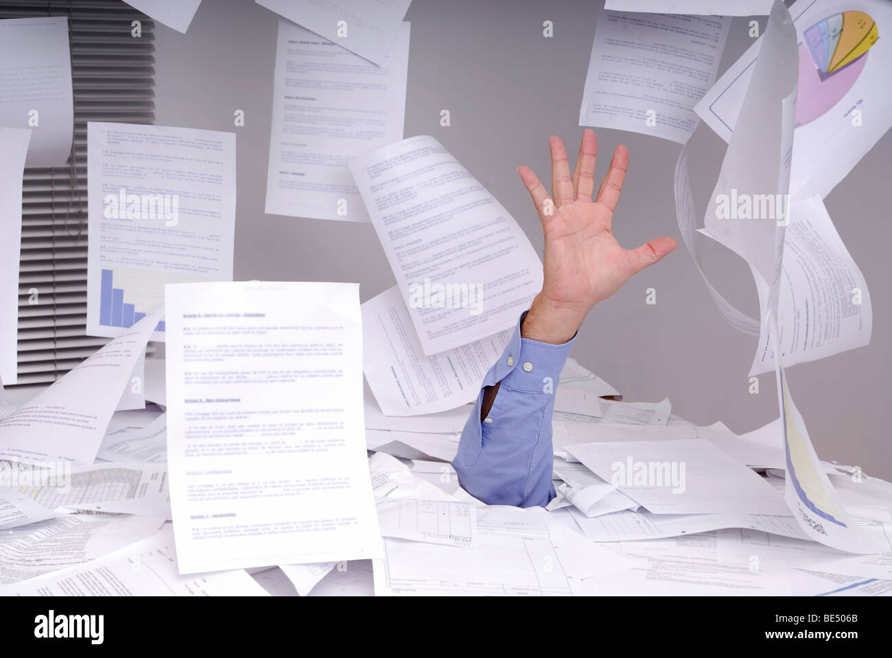Papers Flying Off Desk