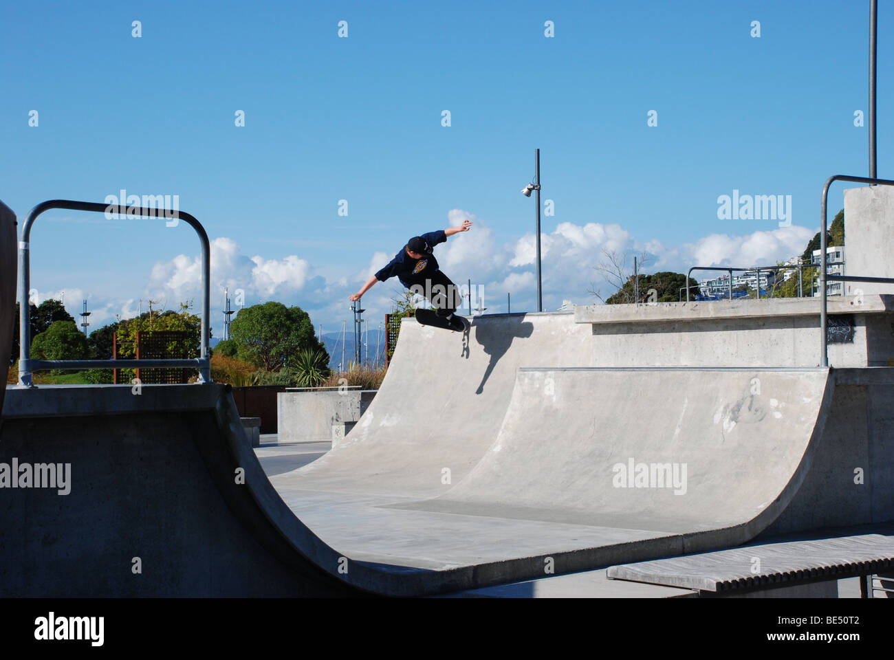 Skateboarder on half pipe in Wellingtons skate park on the Waterfront ...
