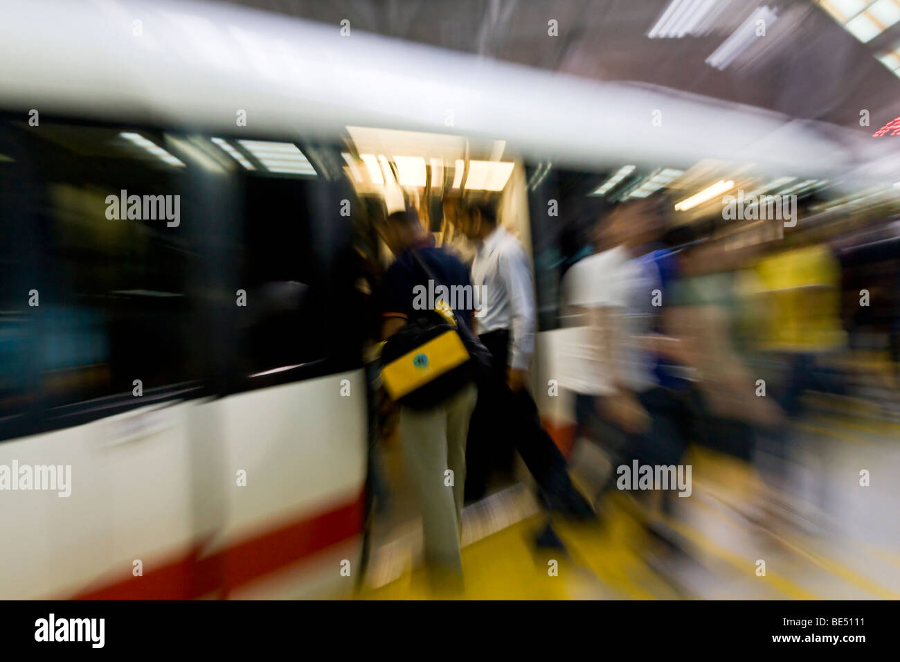 Blur fast movement motion. People in the crowded metro subway train in ...