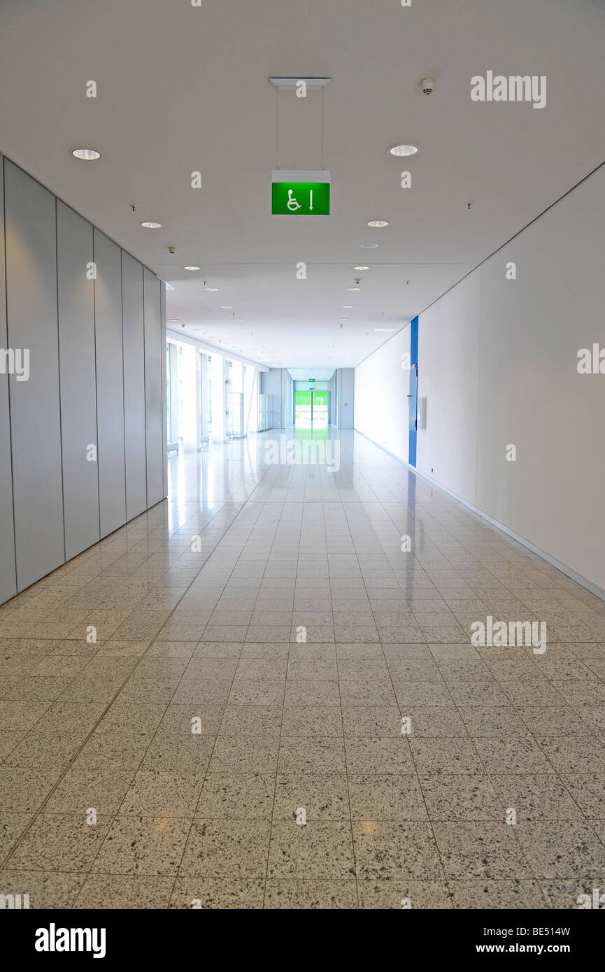 Escape corridor with a sign for wheelchair users Stock Photo - Alamy