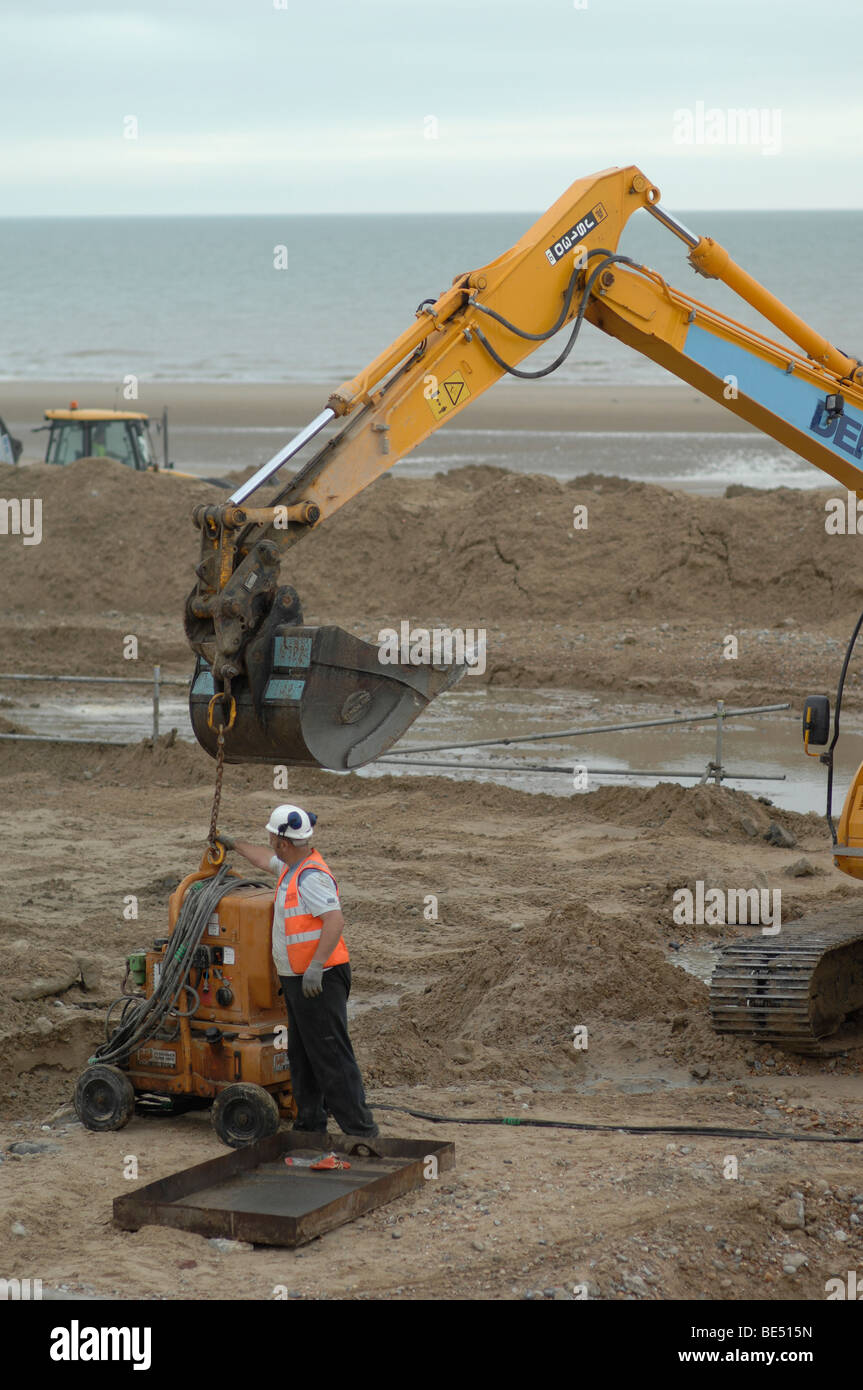 Building sea defences on Hythe beach, Kent Stock Photo - Alamy
