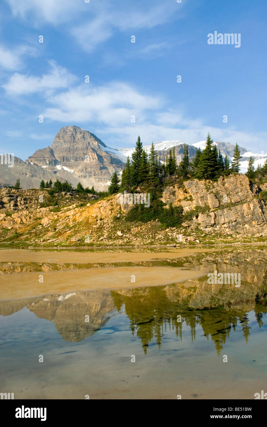 Isolated Peak reflected in alpine tarn, Yoho National Park British ...