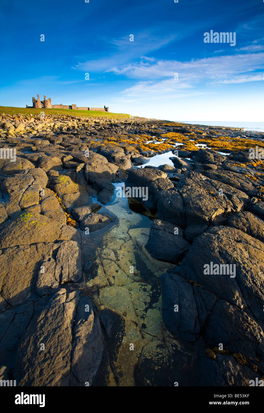 England, Northumberland, Dunstanburgh Castle. Dunstanburgh Castle and ...