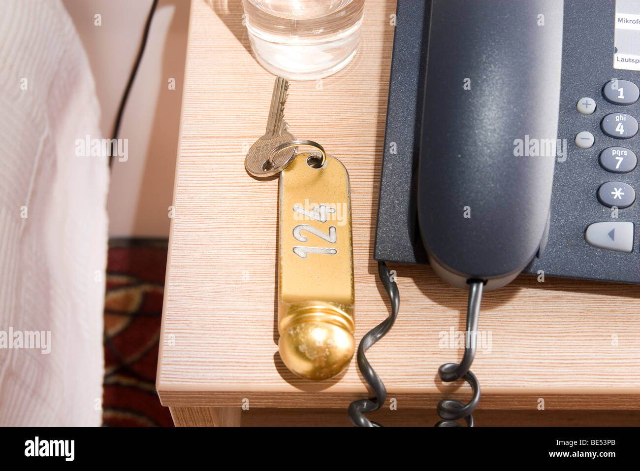 hotel room showing telephone and room keys Stock Photo - Alamy