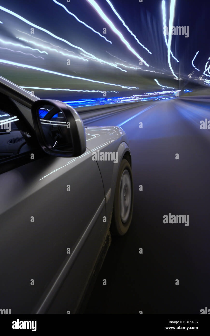 Fast mooving car at night Stock Photo - Alamy