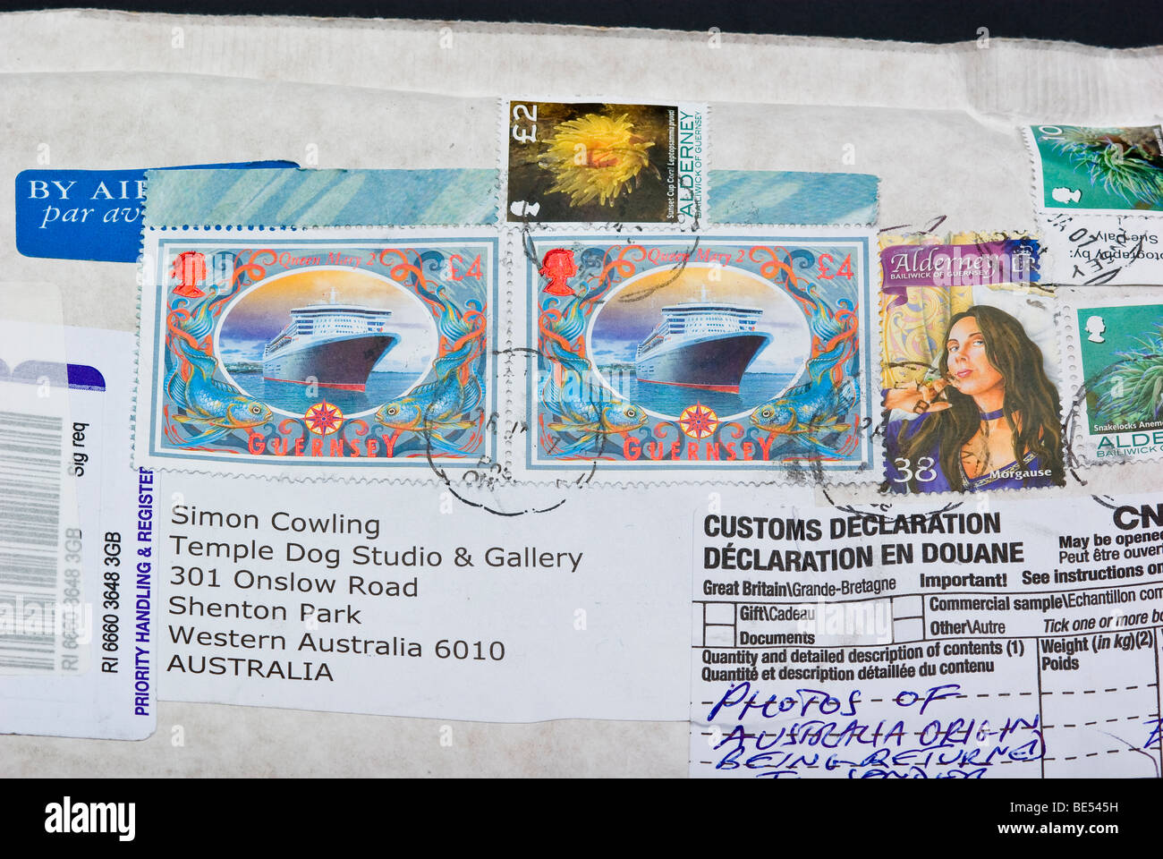 Envelope with colorful stamps from Guernsey and showing customs ...