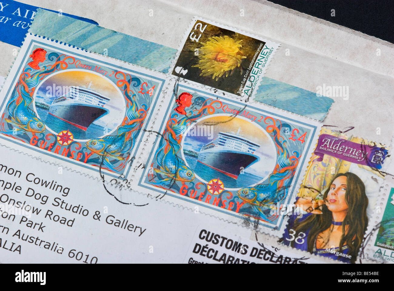 Envelope with colorful stamps from Guernsey and showing customs ...