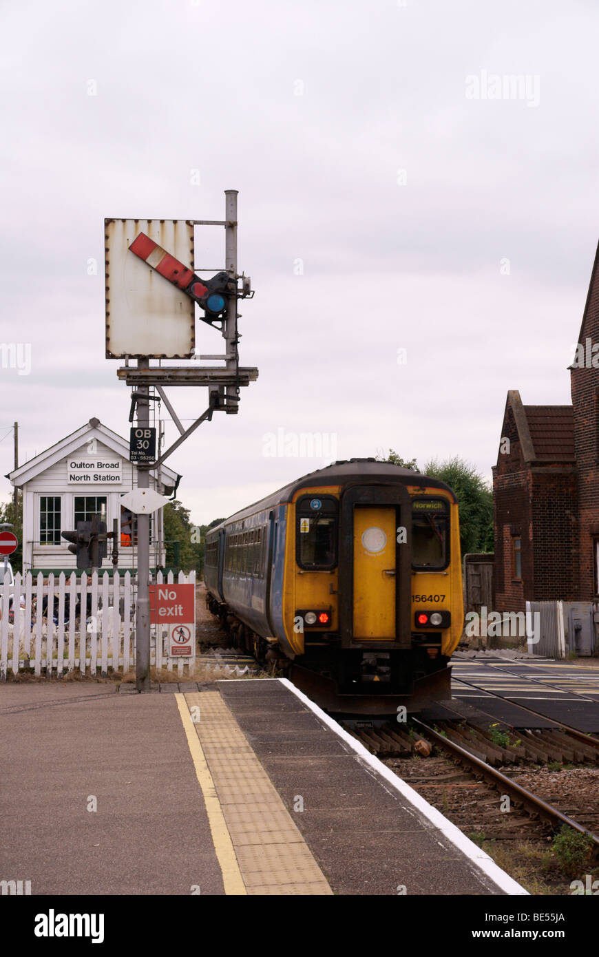 A National Express departs Oulton Broad North station, bound for ...