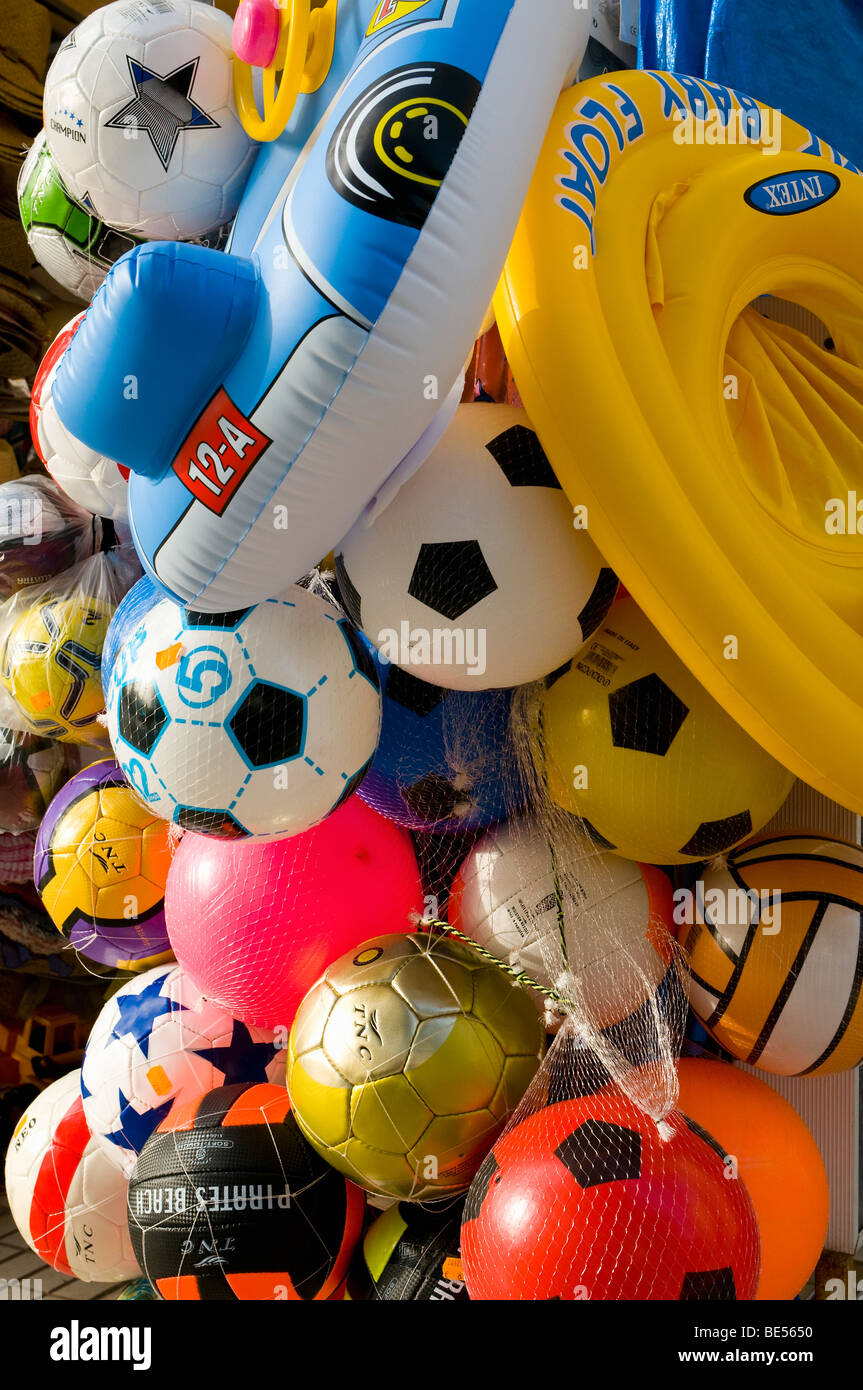 Colourfull display of inflatables and beach balls Stock Photo - Alamy