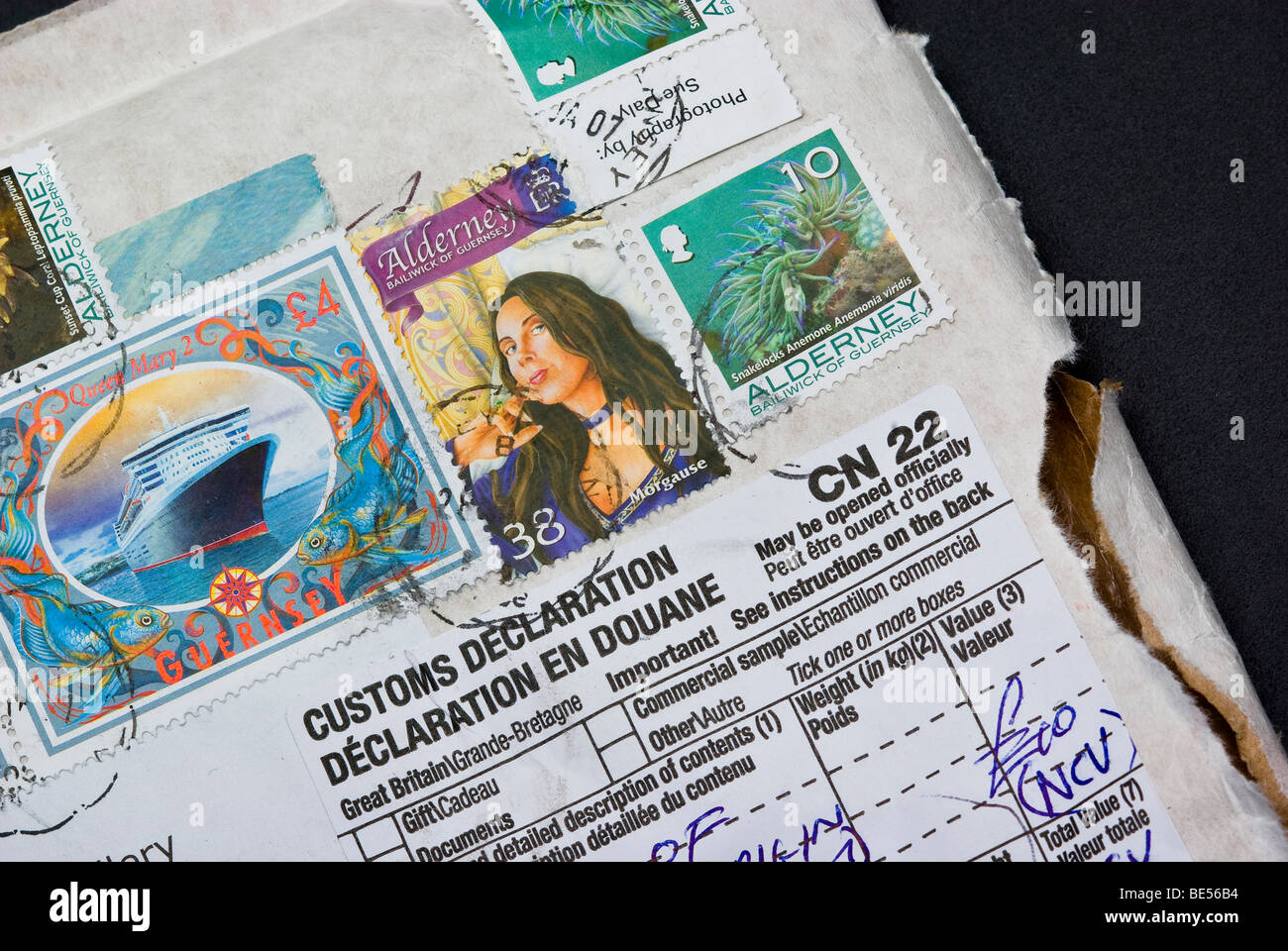 Envelope with colorful stamps from Guernsey and showing customs ...