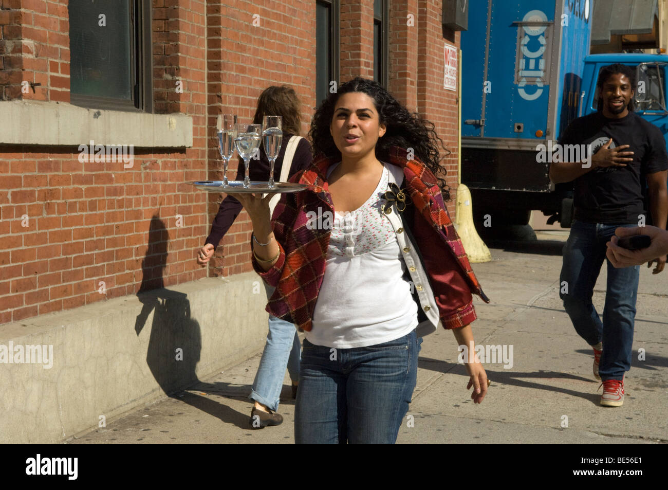 A waitress from Abe & Arthur's restaurant competes in their waiter ...