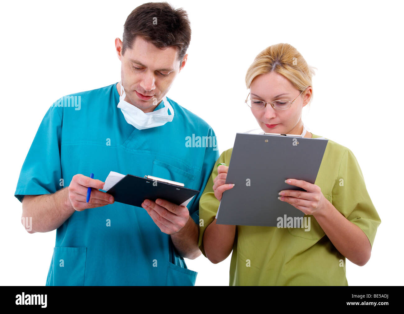 two doctors are working with schedule list Stock Photo - Alamy