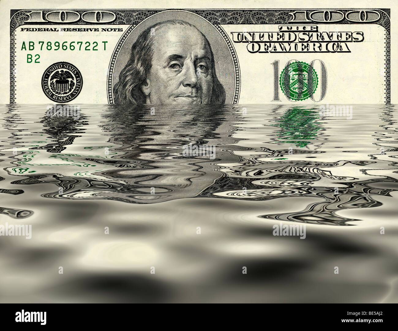 One hundred dollar bill sinking in water Stock Photo - Alamy