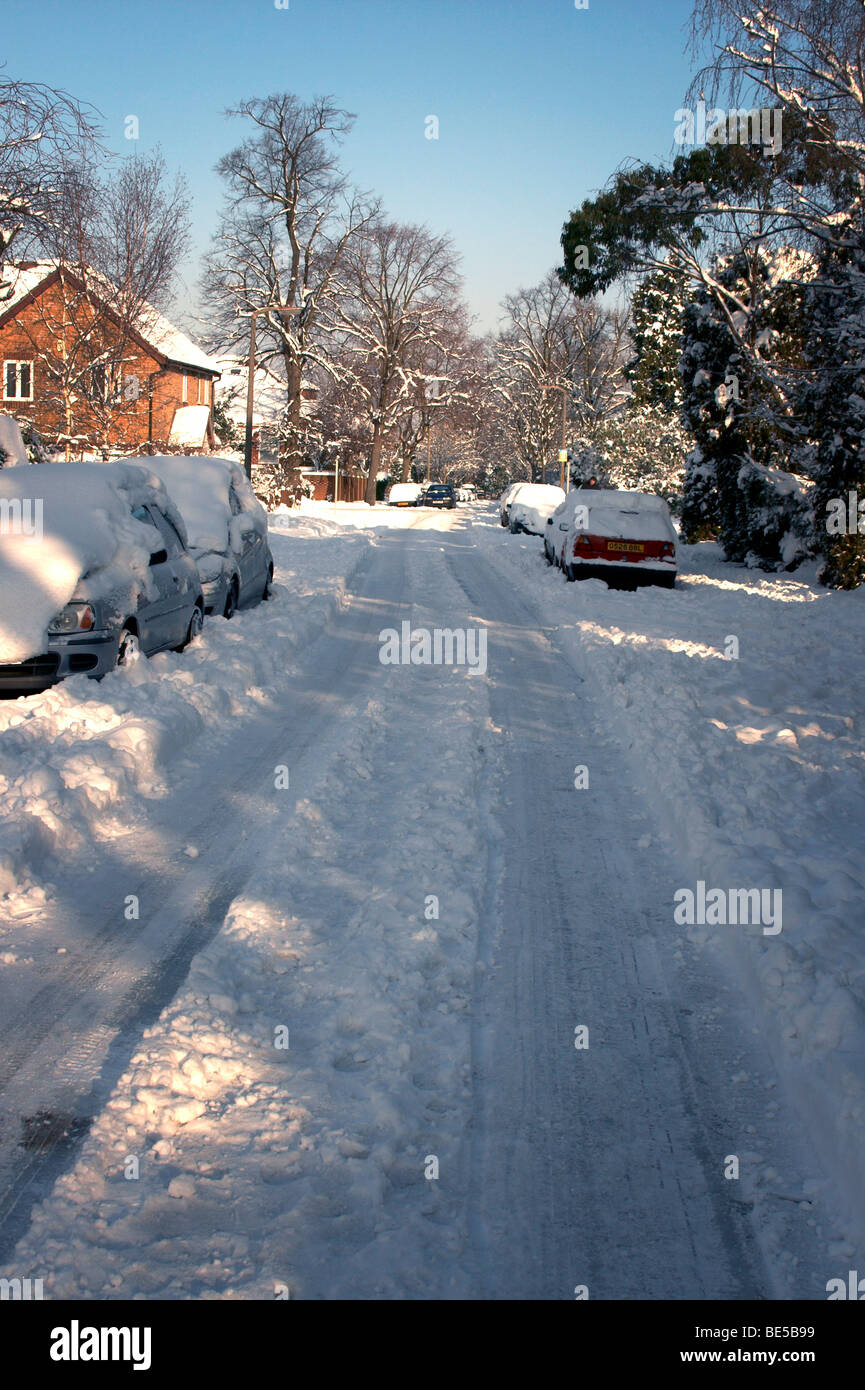 Suburban street covered in snow Stock Photo - Alamy