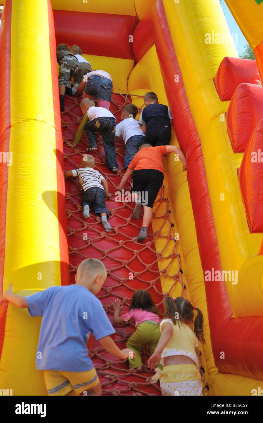 Fun on giant slide Stock Photo - Alamy