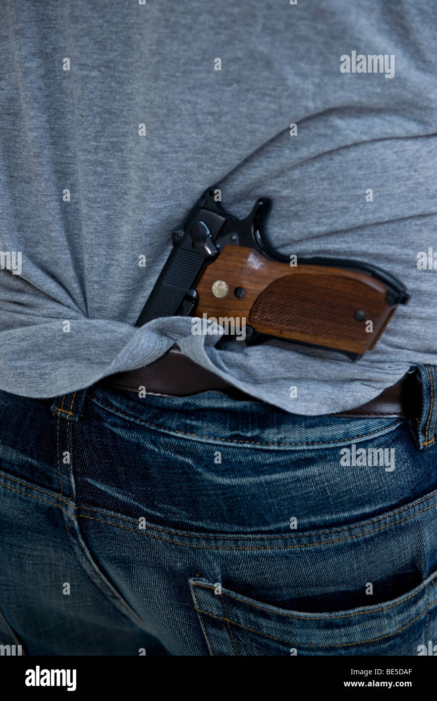 Hiding weapons hi-res stock photography and images - Alamy