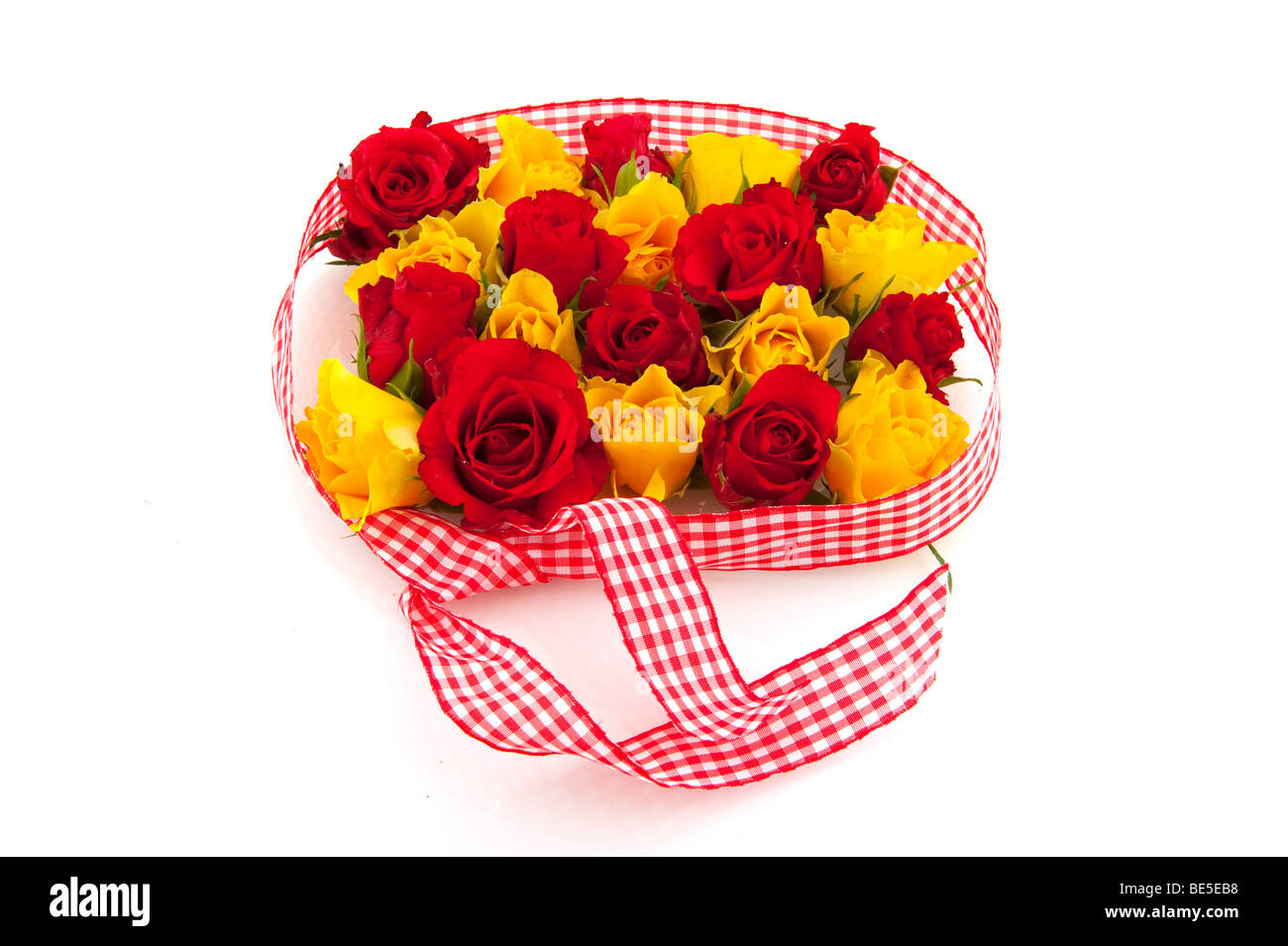 arrangement with red and yellow roses Stock Photo - Alamy
