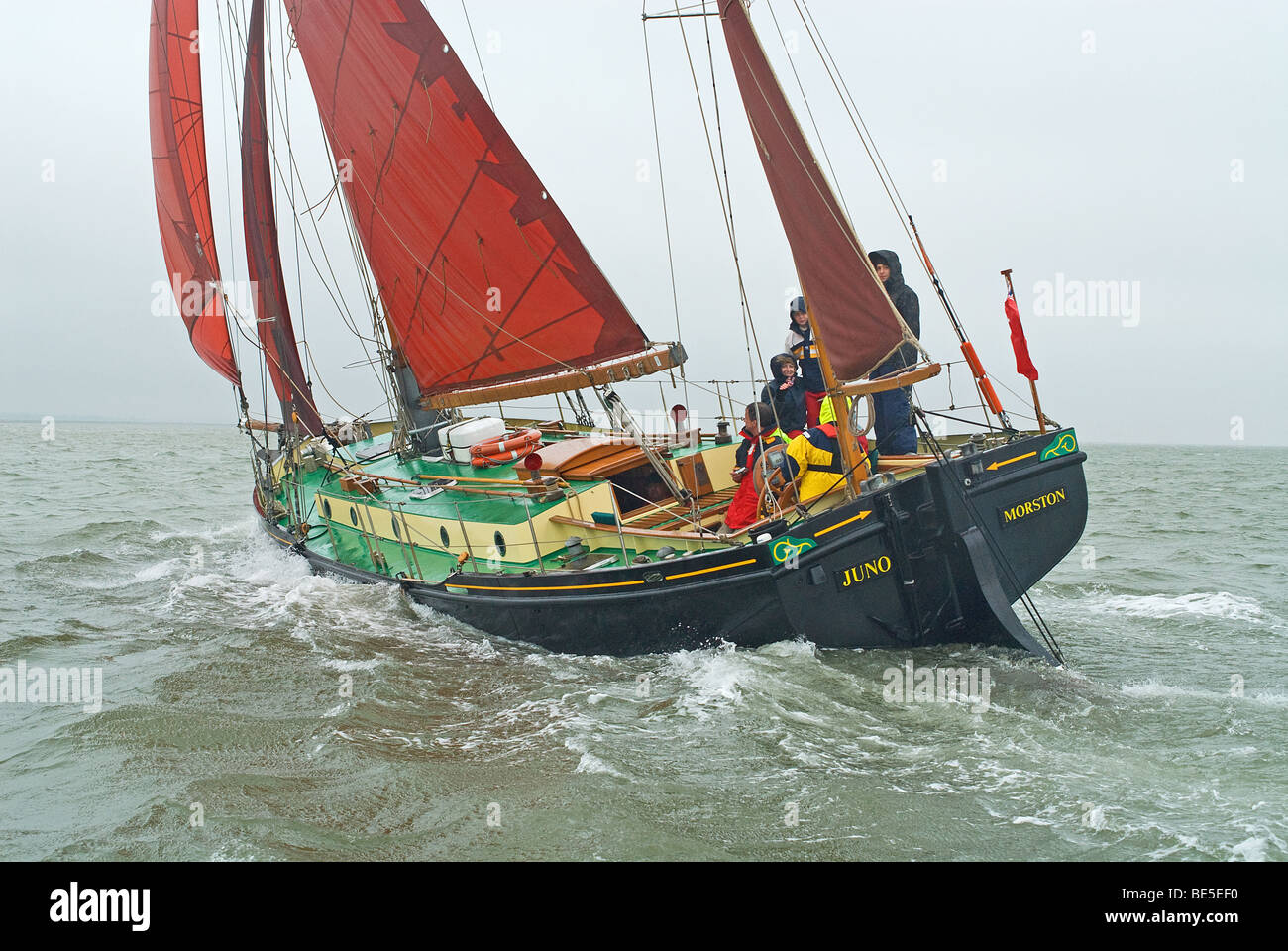 Sailing barge Juno on charter in the rain off the Norfolk coast Stock ...