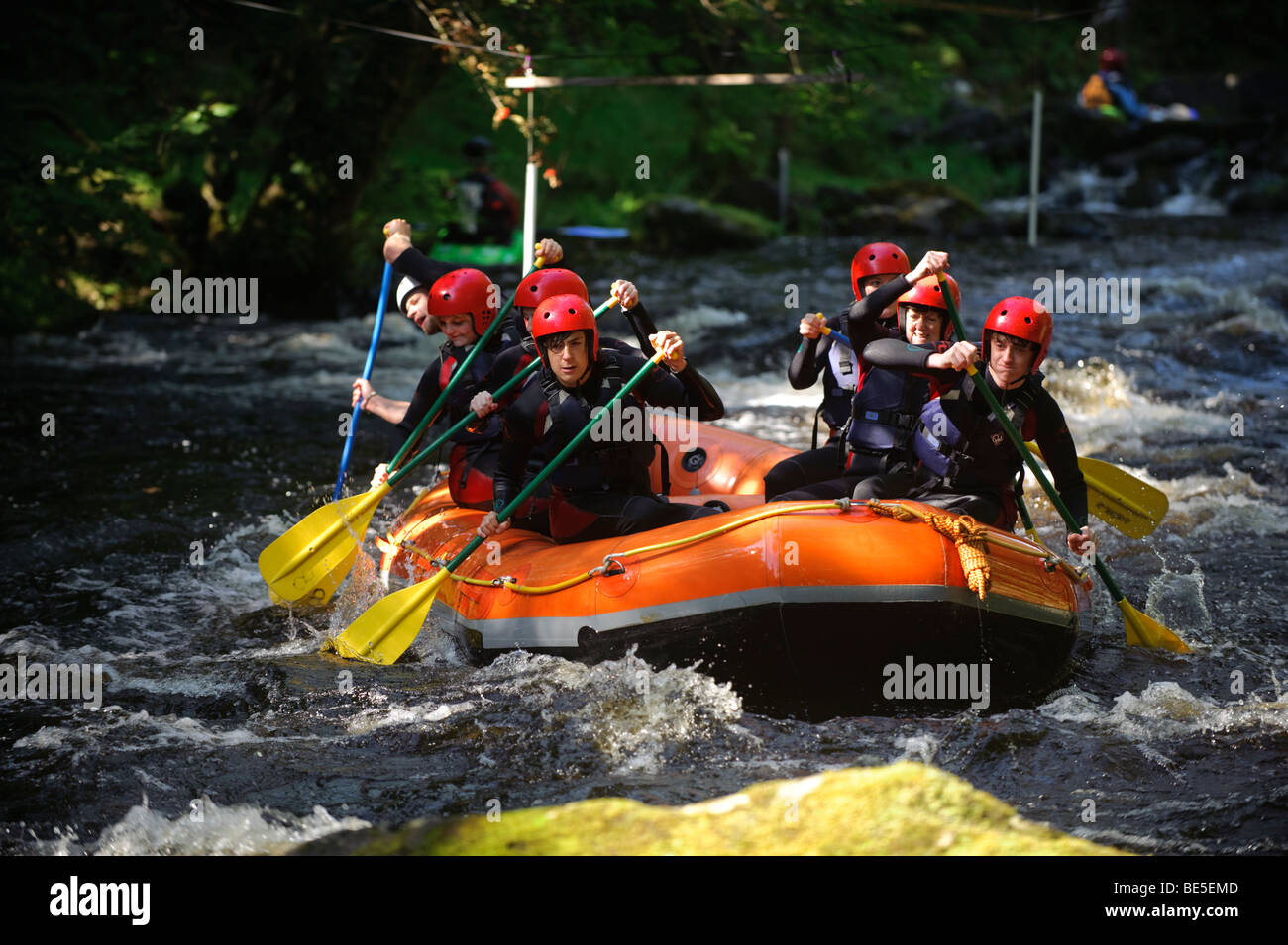 Group of people white water rafting on the Tryweryn river, National ...