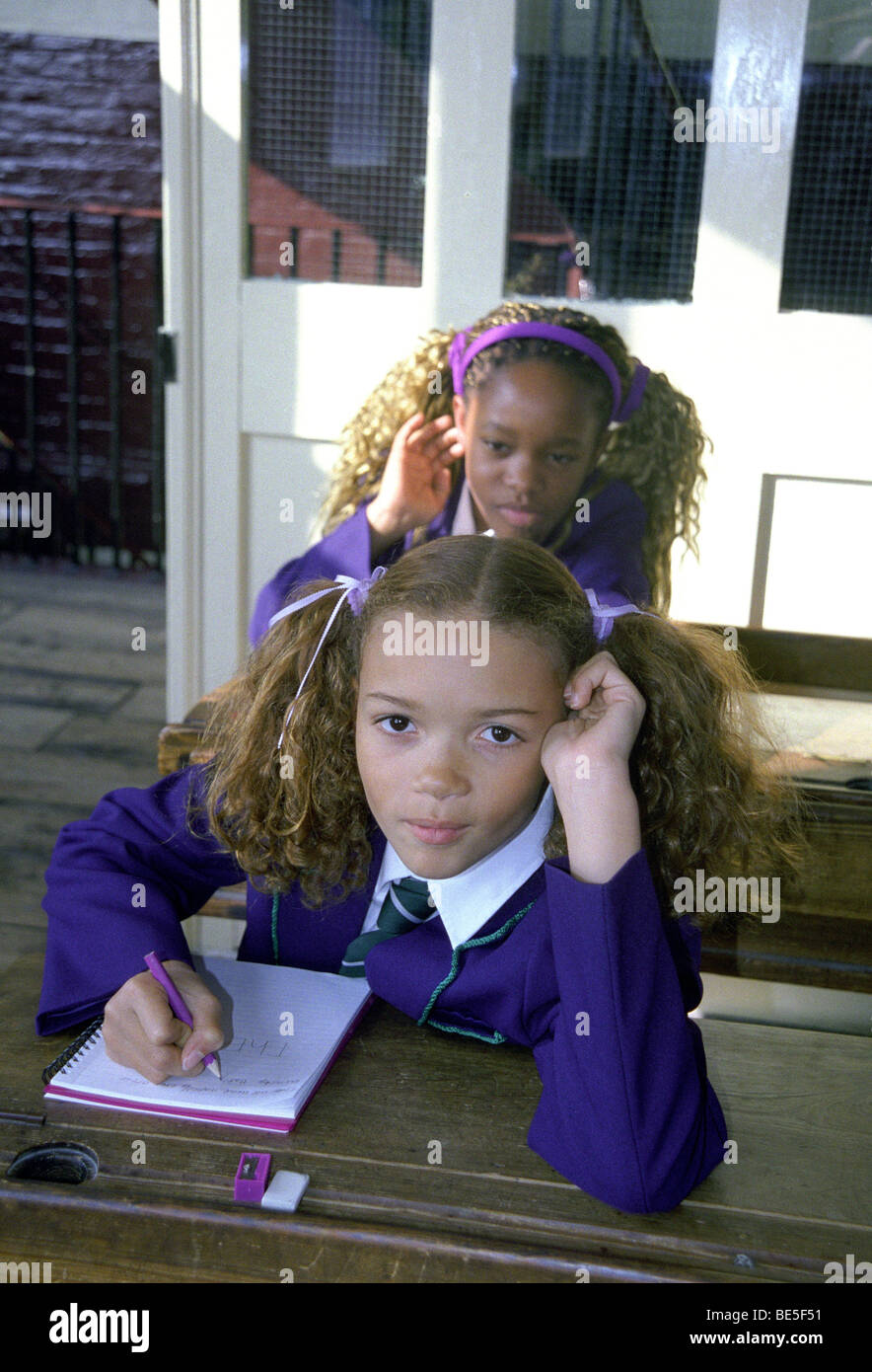 Pretty schoolgirls in a classroom Stock Photo - Alamy