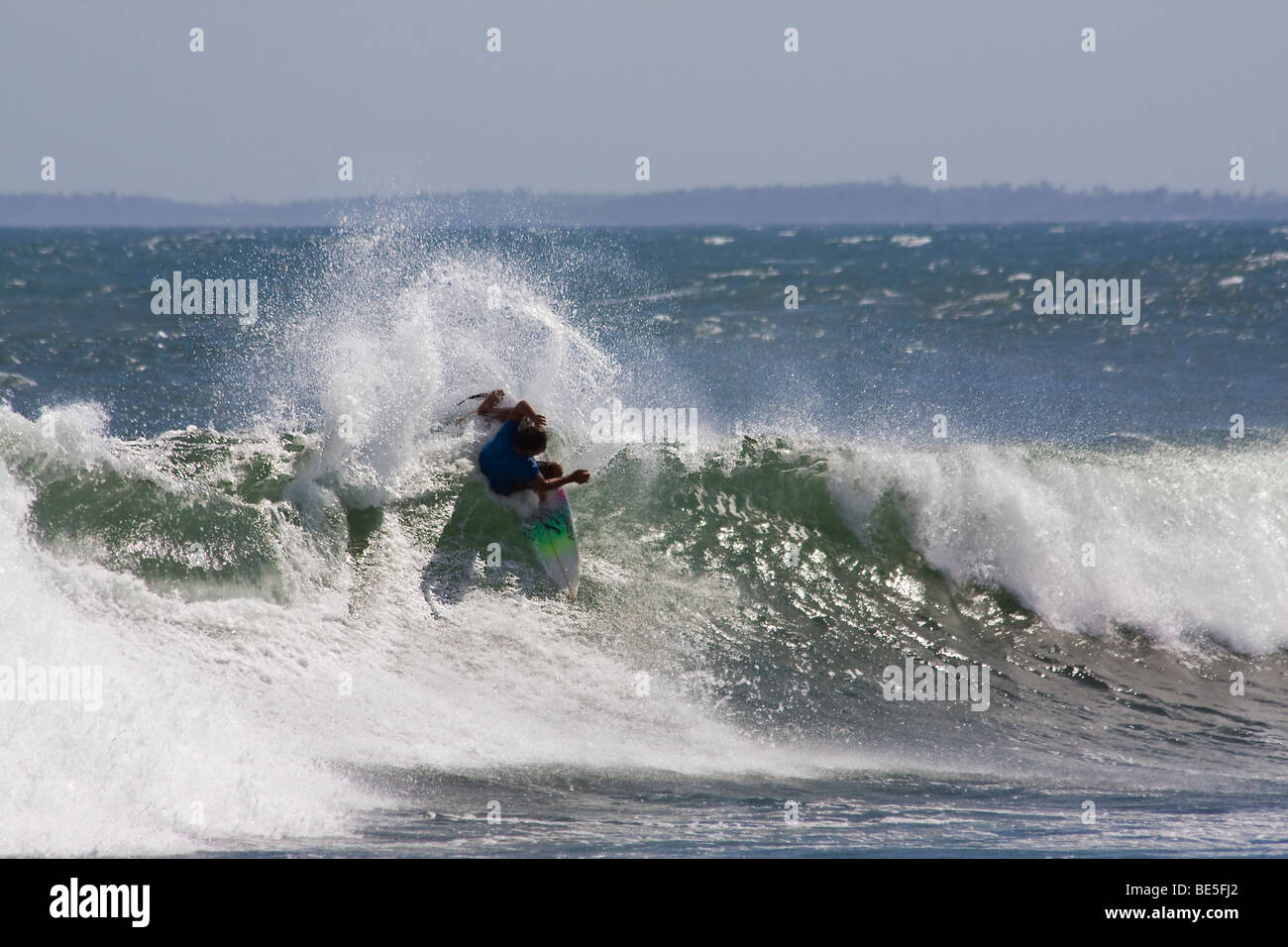 Surf Indonesia. Surfer on the long left wave in Medewi village ...
