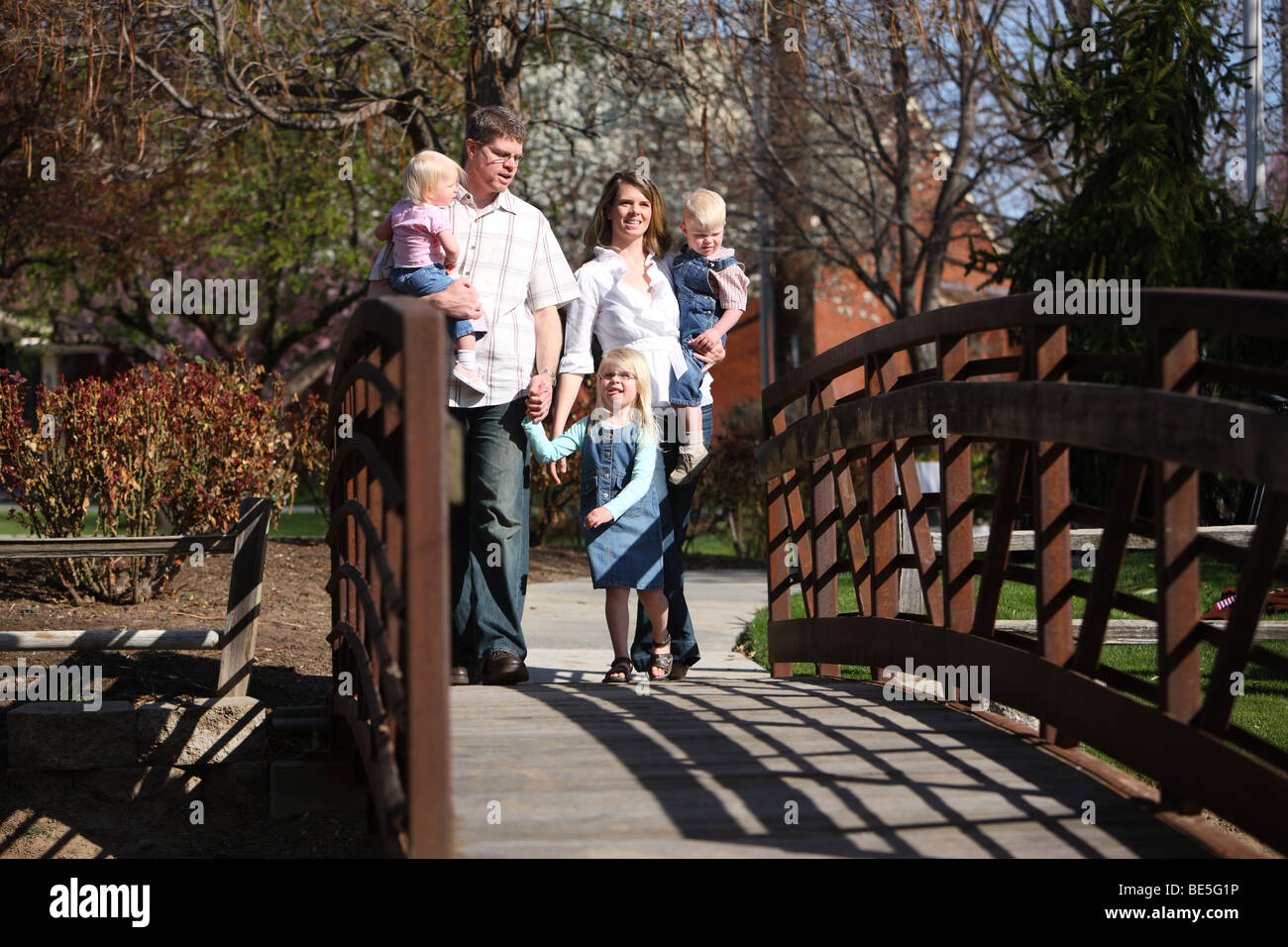 People walking across bridge hi-res stock photography and images - Alamy