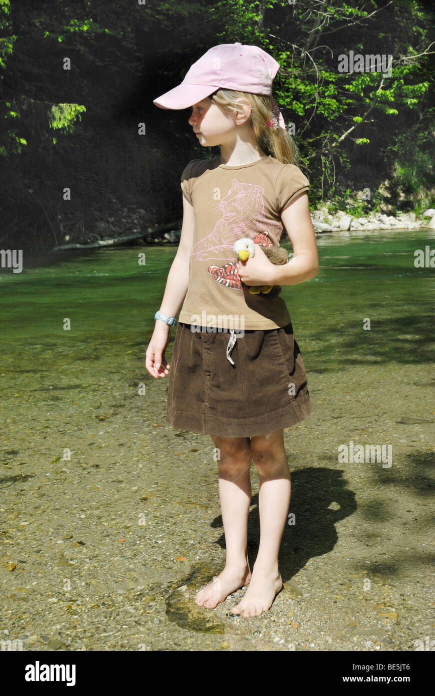 Little girl, 7 years, blond, barefoot in the creek, Leitzachtal valley ...