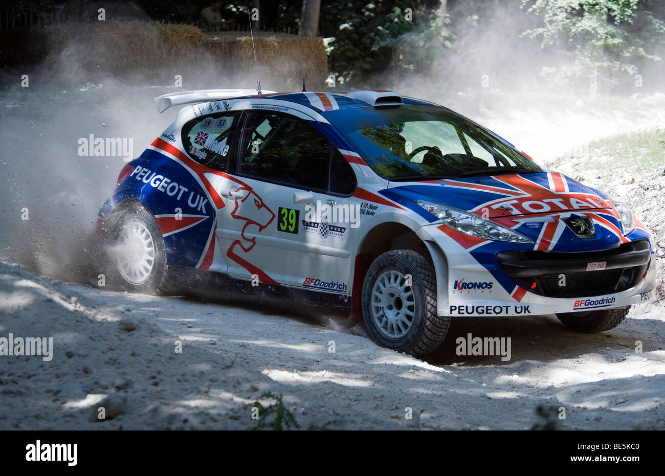 Chris Meeke driving his 2009 Peugeot 207 S2000 Rally Car on the rally ...