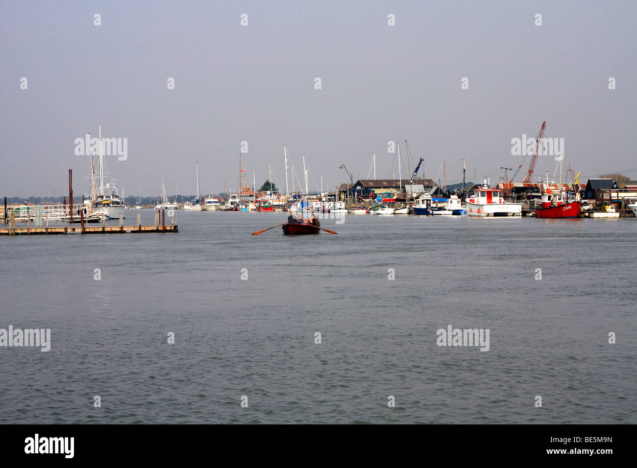 The ferry boat crossing the River Blythe in the harbour at Southwold ...