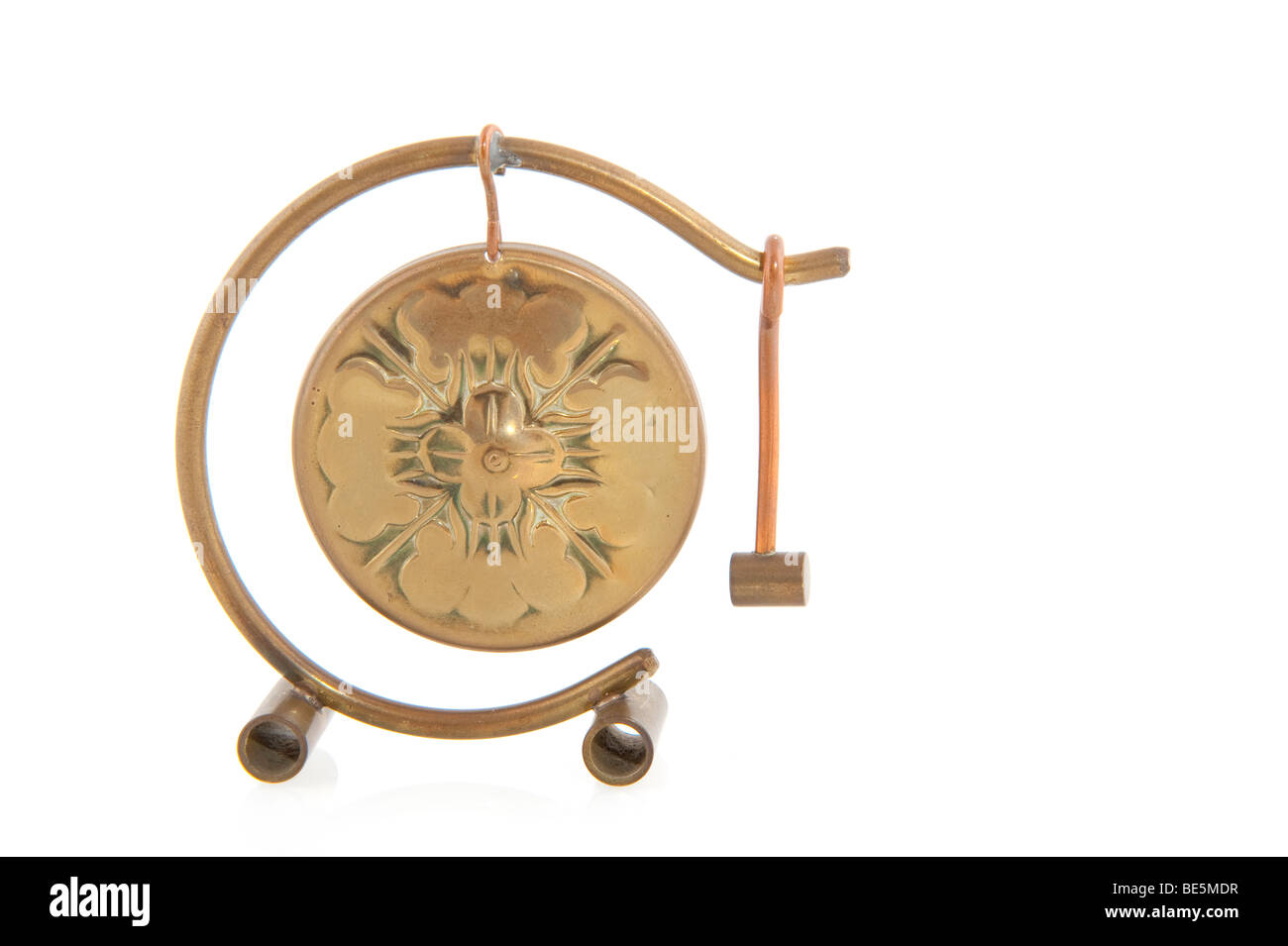 Chinese copper gong with hammer isolated over white Stock Photo - Alamy