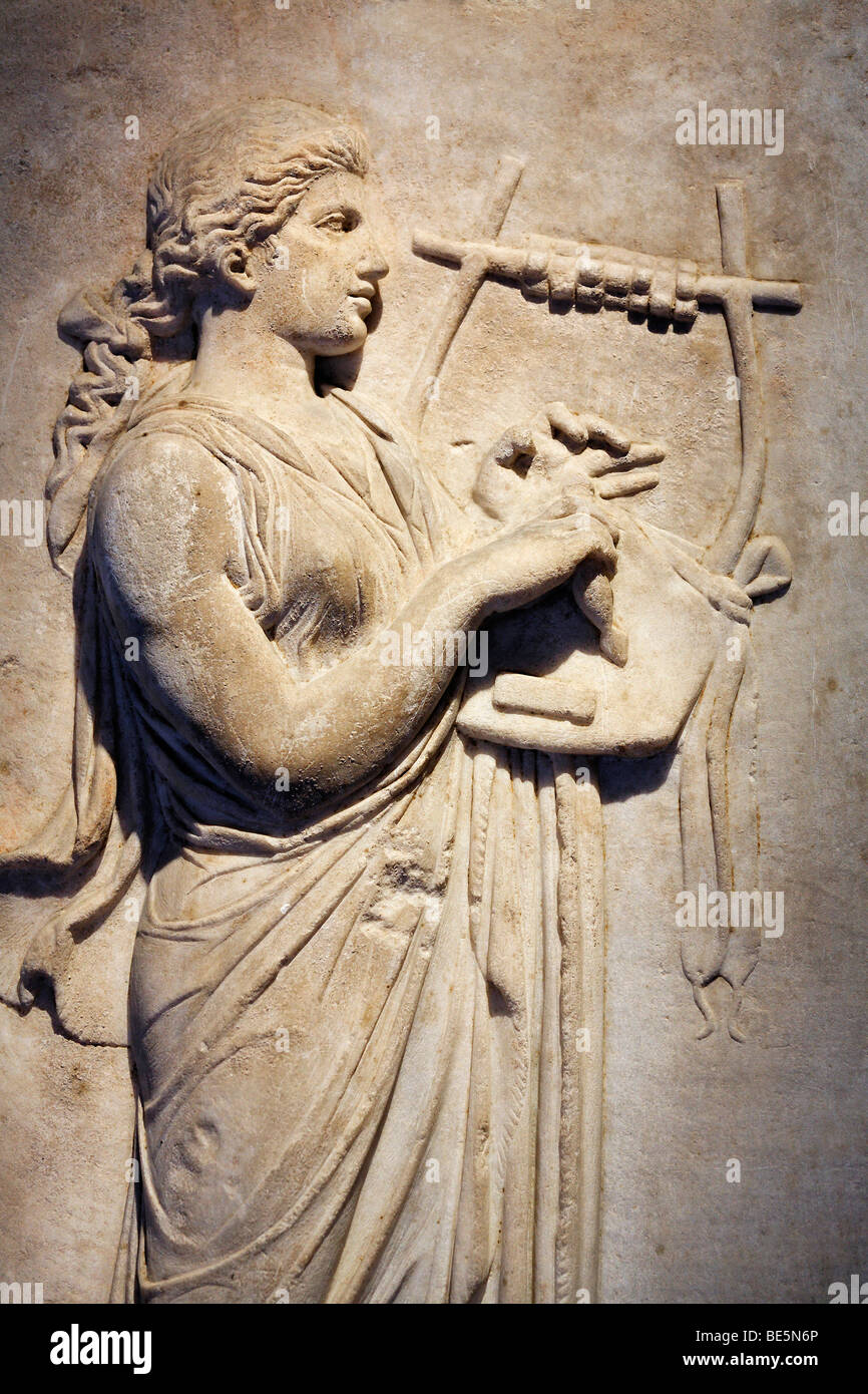 Muse plays Kithara, Hellenistic stone relief, Archeological Museum ...