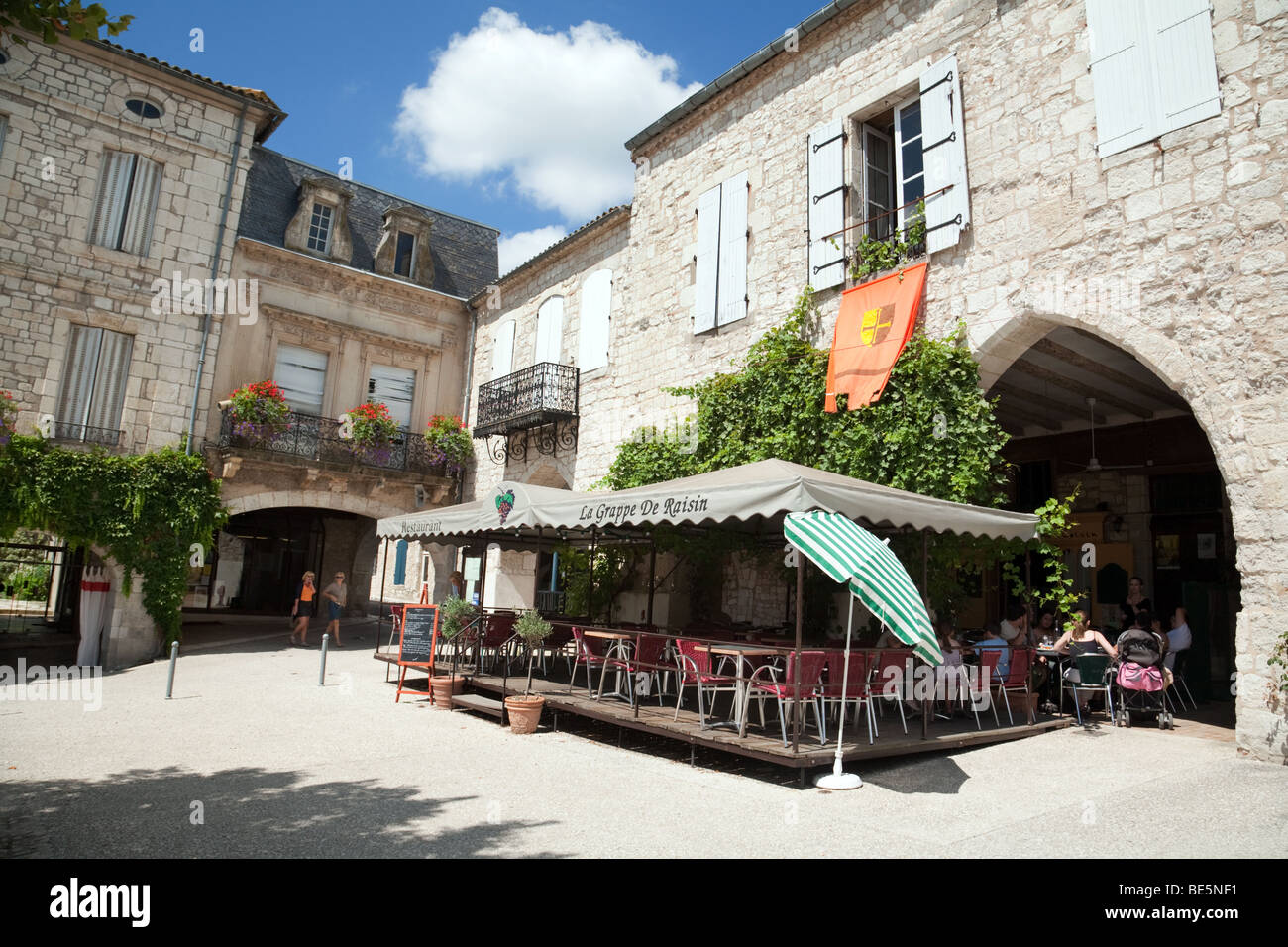 Tourists in Monflanquin, a Bastide village in Aquitaine, France Stock ...