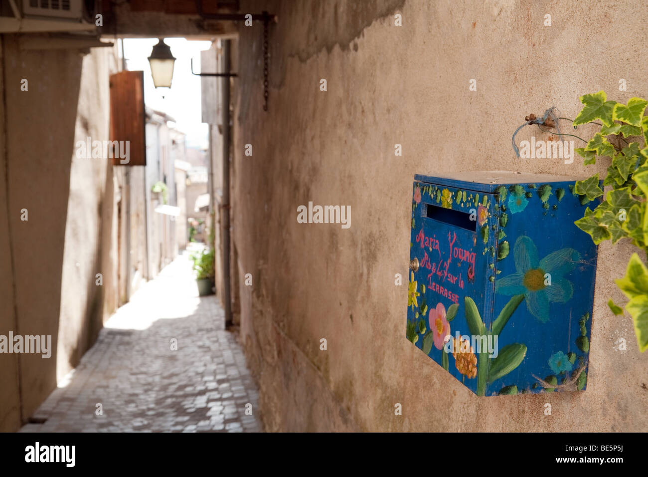 A personal mailbox on a quiet narrow street in the medieval Bastide ...
